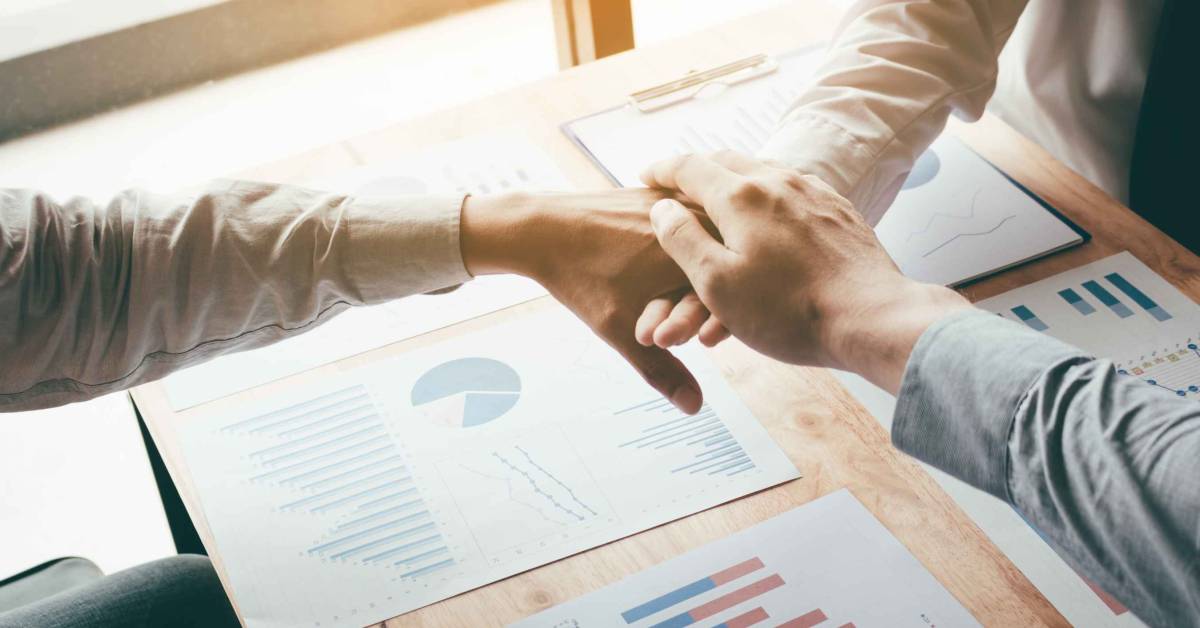 What Happens to Stocks When Companies Merge?