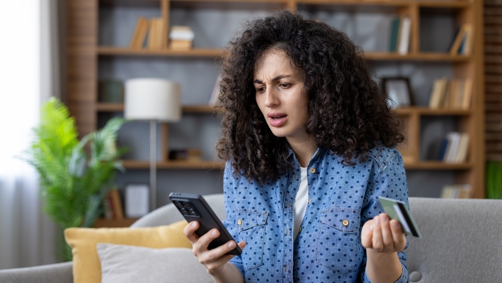 Credit card swipe fees cost households $1,200 per year